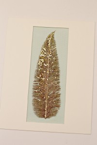 Easy Framed Feather - Organize and Decorate Everything